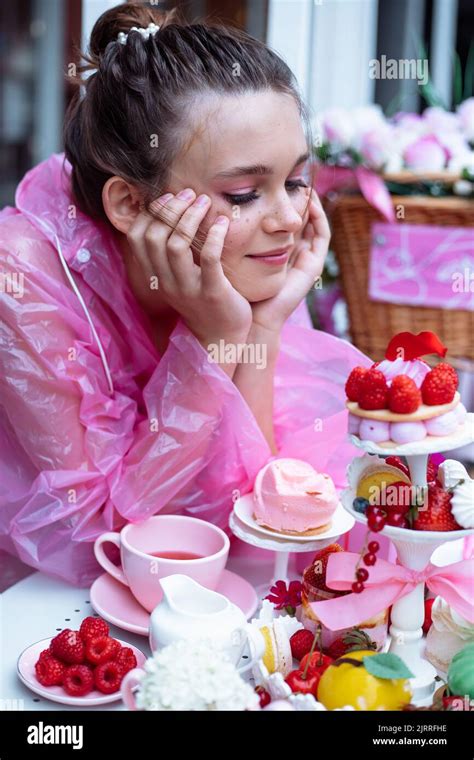 Close Up Vertical Smiling Dreaming Teenage Girl In Pink Raincoat Joy