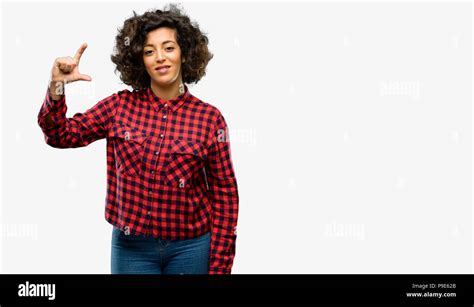 Beautiful Arab Woman Holding Something Very Tiny Size Concept Stock