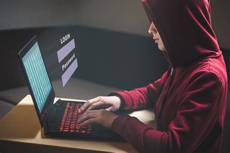 Dangerous Hooded Woman Hacker Breaks Into Personal Data And Infects System With A Virus Hacker