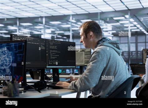 Technician Using Artificial Intelligence Technology To Optimize Data Center Workplace Machine