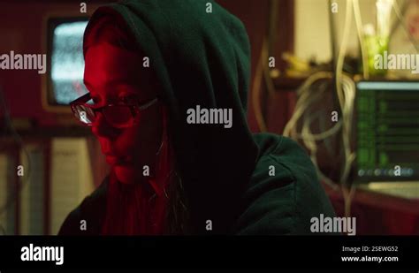 Hacker Typing On Keyboard At Night Thinking How To Break Password