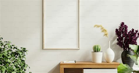 아름다운 식물이 있는 나무 캐비닛에 있는 모형 사진 프레임 3d 렌더링 사진 Unsplash의 실내 이미지