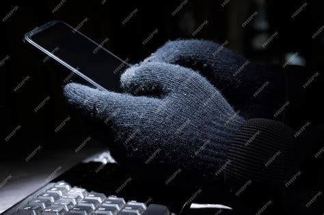 Premium Photo Hacker Hand Hacking Mobile Phone Security Cyber