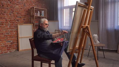 Elder Man Spending His Free Time With Hobby Visiting Art Studio Class