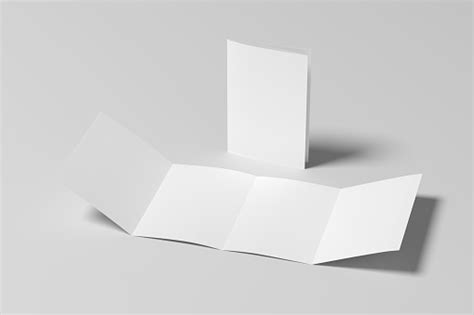 수직 이중 게이트 접이식 브로셔 패널 4개 8페이지 빈 전단지 프리젠 테이션 디자인을 위해 흰색 배경에 대해 모의 전개되고 접혀