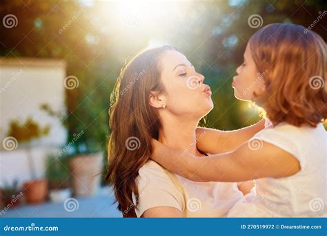Kissy Face A Mother And Daughter Spending Quality Time Together Stock