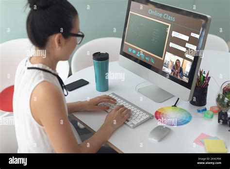 Asian Woman Using Computer For Video Call With Class On Screen Communication Technology And