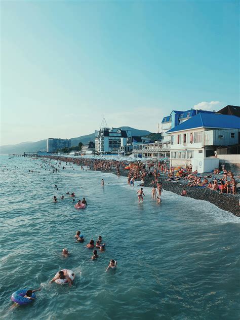 집 밖의 가족 강가 경치 경치가 좋은 공공 장소 관광 구름 낀 하늘 도시 해변 레저 레크리에이션 리조트 타운 모래 모임 미국 미션 비치 바다