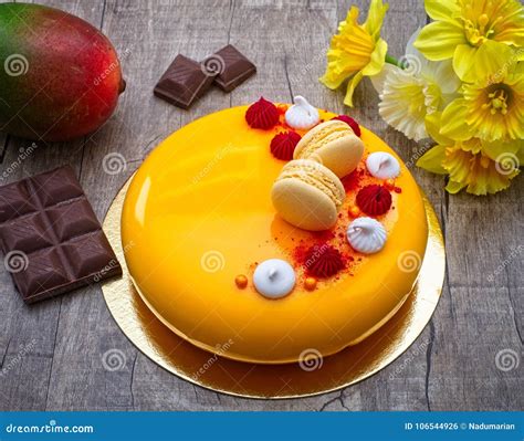 Mango Cake With Chocolate Mango And Passion Fruit Mousse With Crunchy