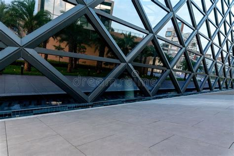 Modern Architectural Building With Geometric Glass Facade Stock