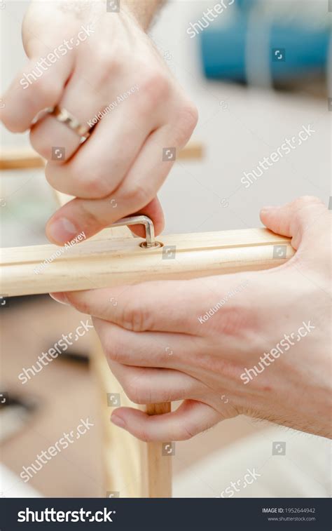 Male Hands Assemble Wooden Furniture By Stock Photo Shutterstock
