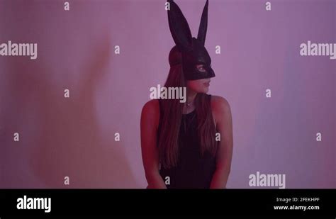 Sexy Woman In Playboy Hare Mask Reaches For Camera And Makes Panther