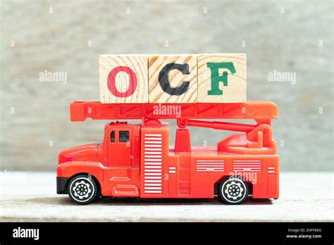 Fire Ladder Truck Hold Letter Block In Word Ocf Abbreviation Of Operating Cash Flow On Wood