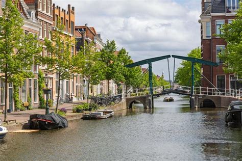 Idyllic Leiden Canal Scene With A Classic Drawbridge Historic Houses