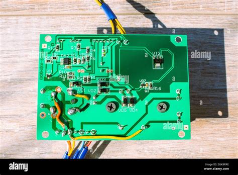 Printed Circuit Board With A Microcircuit For Controlling Electronic Devices Stock Photo Alamy