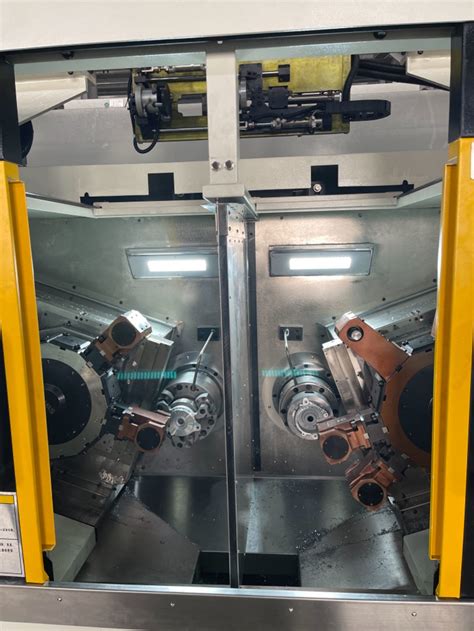 Parallel Double Spindle Cnc Lathe Turning Center Of Tt20 Turn Drill Combination Cnc Lathe