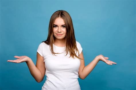 Premium Photo Young Brunette Woman Confused Misunderstanding