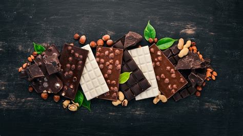 견과류 쿠키 코코아와 초콜릿의 집합입니다 에 검은 나무 배경 최고의 볼 수 있습니다 텍스트에 대 한 공간을 복사 합니다 0명에