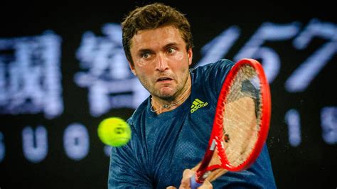 Download Gilles Simon And Tennis Ball Wallpaper Wallpapers Com