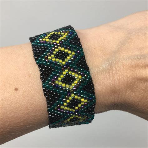 Artisan Jewelry Apache Inspired Black Teal Yellow Diamond Peyote Stitch Seed Bead Bracelet Artisan Jewelry Apache Inspired Black Teal Yellow Diamond Peyote Stitch Seed Bead Bracelet