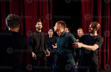 Working Together Group Of Actors In Dark Colored Clothes On Rehearsal