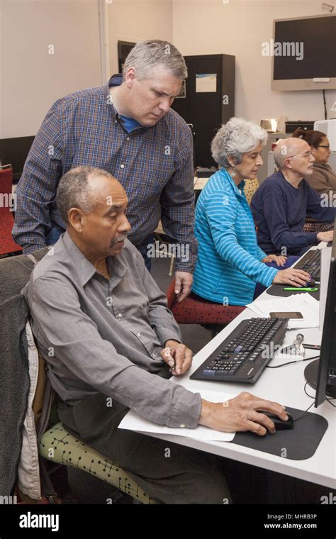 Seniors At A Senior Citizen Center Take A Computer Class In Lower