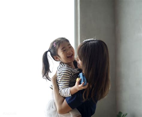 Download Premium Image Of Cheerful Japanese Mother And Daughter About