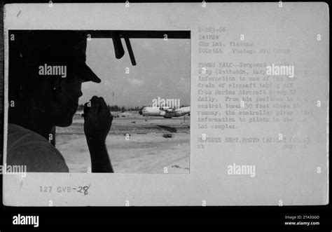 Marine Corps Sergeant Ronald A Stup From Bethesda Maryland Relays Information To Planes