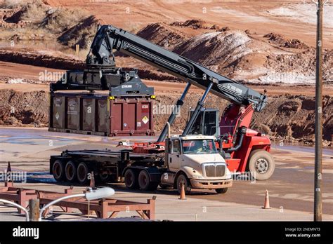 a reachstacker container handler removes a filled and washed container