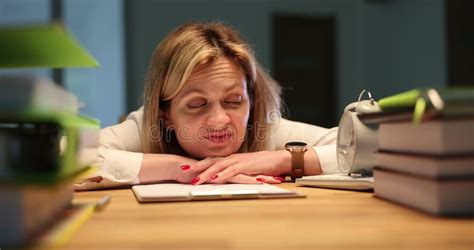 Lazy Businesswoman Lying On Table In Office And Lounging Late At Night