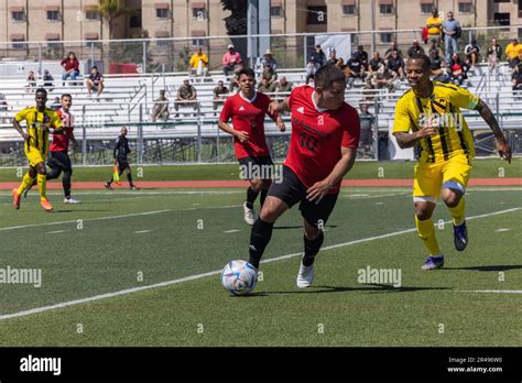 A Us Marine With The Marine Corps Soccer Team Defends The Ball During