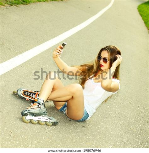 Sexy Girl On Roller Skates Sitting Stock Photo Shutterstock