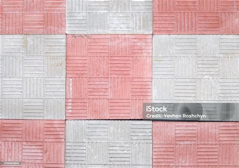 회색과 빨간색 색상의 콘크리트 코팅 회색과 분홍색 포장기클로즈업의 보도 질감 곱슬 회색 오렌지 돌에서 배경 보도 의 상단 보기