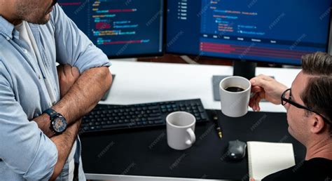 Premium Photo It Developers Discussing Online Software Development Information Sellable