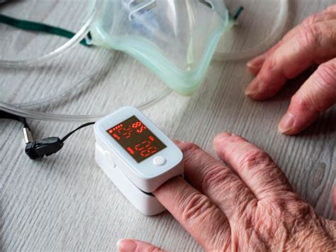 Premium Photo Cropped Hands Of Woman Checking Pulse Trace