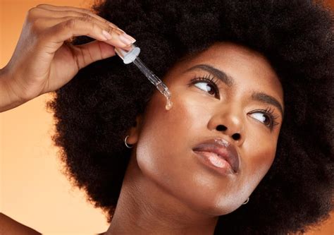 Face Serum Skincare And Black Woman Using Beauty Oil Product With