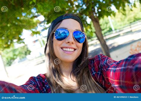 Portrait Of Beautiful Girl Taking A Selfie With Mobile Phone Stock