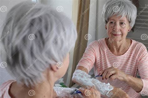 Senior Woman Shaving Her Hairy Forearms Stock Image Image Of Mature