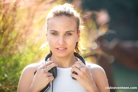 sweet azure angel stretches her pussy outdoors photos