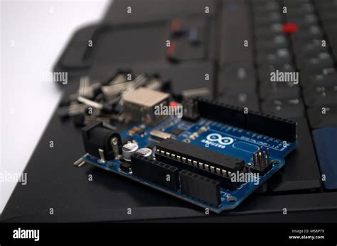 Arduino Wires And Around Transistors Lined Up On A White Background Stock Photo Alamy