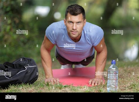 Man Making Push Ups Outdoors Stock Photo Alamy