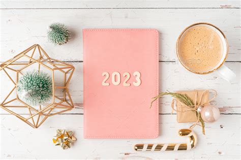 Christmas Pink Notepad With 2023 Letters Text Flat Lay On White Wooden