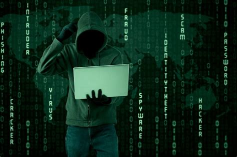 premium photo hacker using laptop against binary codes