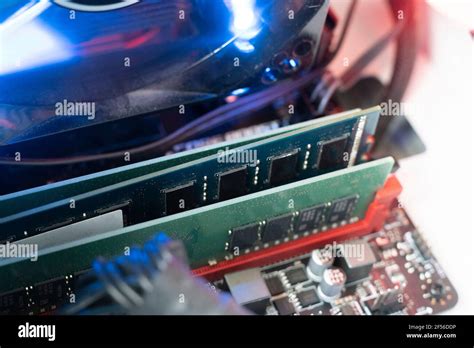 The Inserting Plug In The Ram Ddr Memory Card In The Computer Mainboard