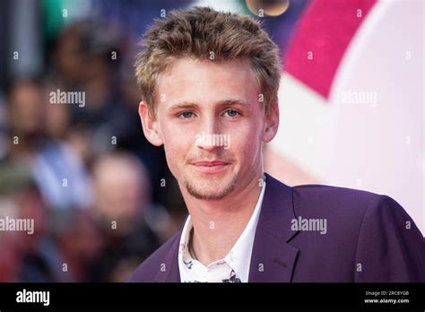 Magnus Ferrell Poses For Photographers Upon Arrival At The Premiere Of