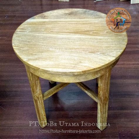 Round Table With Rustic Design Made From Teak Wood