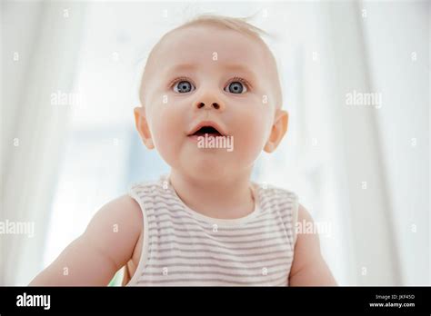 Portrait Of Curious Baby Boy Stock Photo Alamy