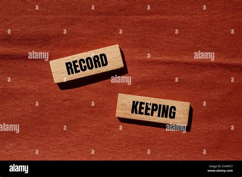 Record Keeping Message Written On Wooden Blocks With Brown Background Conceptual Record Keeping