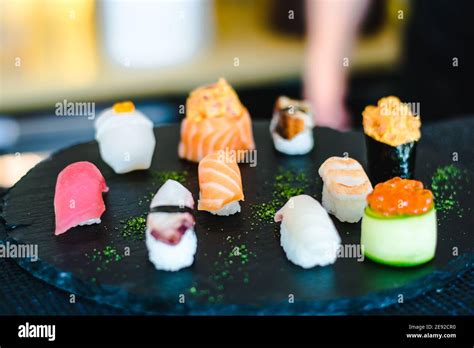 Maki And Nigiri Sushi Variety With Salmon Shrimp Avocado And Tuna At