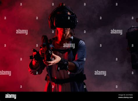 Portrait Of Young Girl Killer Using Technology As Vr Headset Goggles
